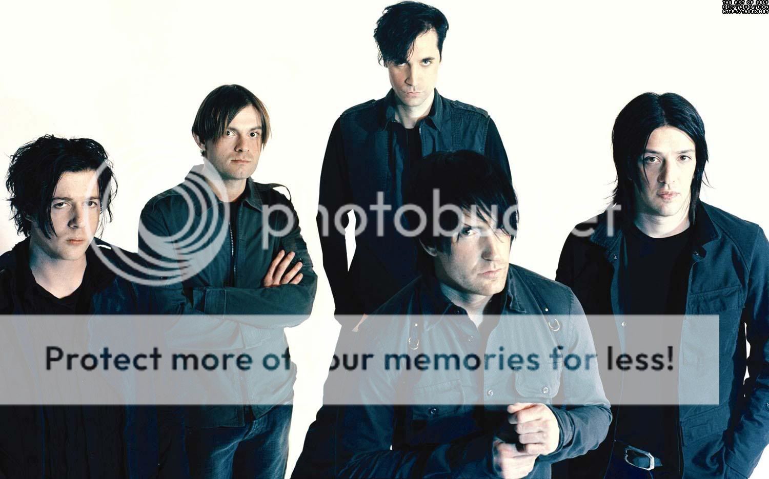 L-R: Aaron North, Alessandro Cortini, Jerome Dillon, Trent Reznor ...